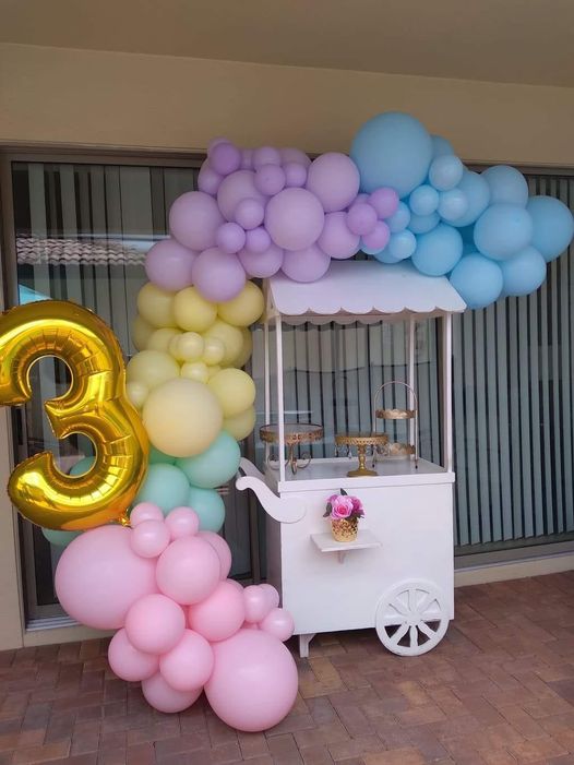 Candy cart With Pastel colors balloons and Number | Orlando Party Express